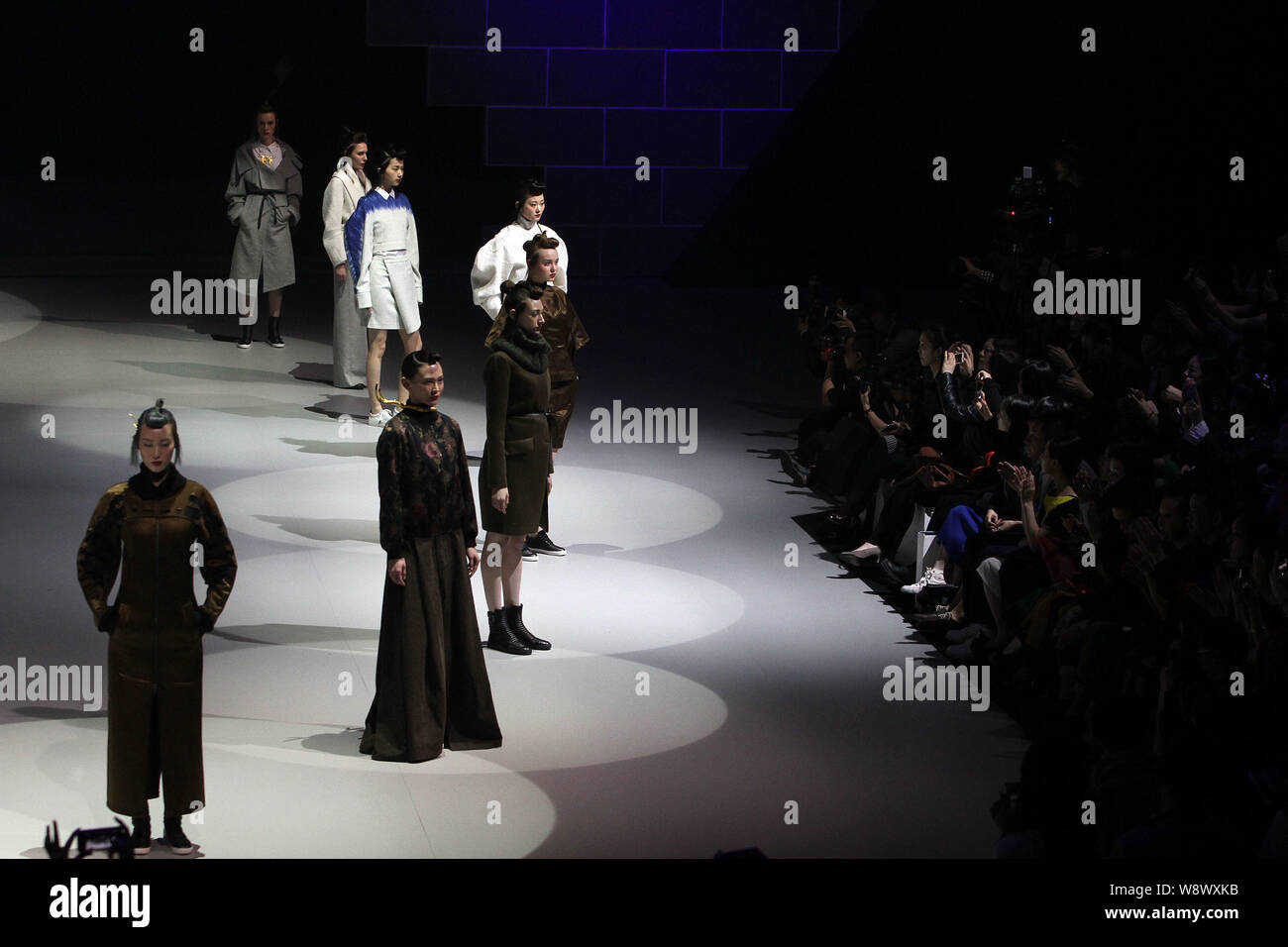 Models display new creations by Chinese fashion designer Simon Gao at the Simon Gao fashion show ...