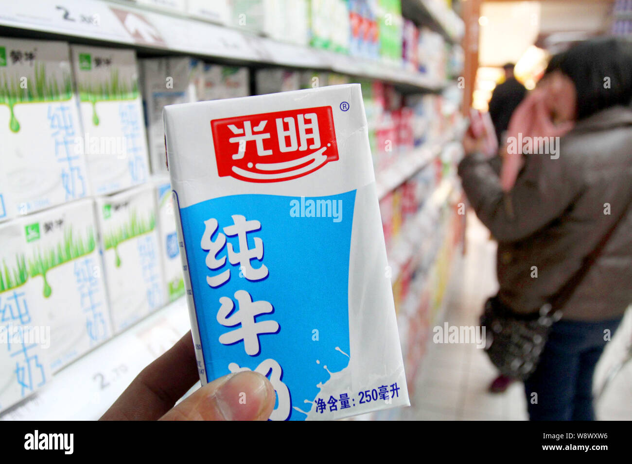 --FILE--A customer buys a carton of pure milk of Bright Dairy, a ...
