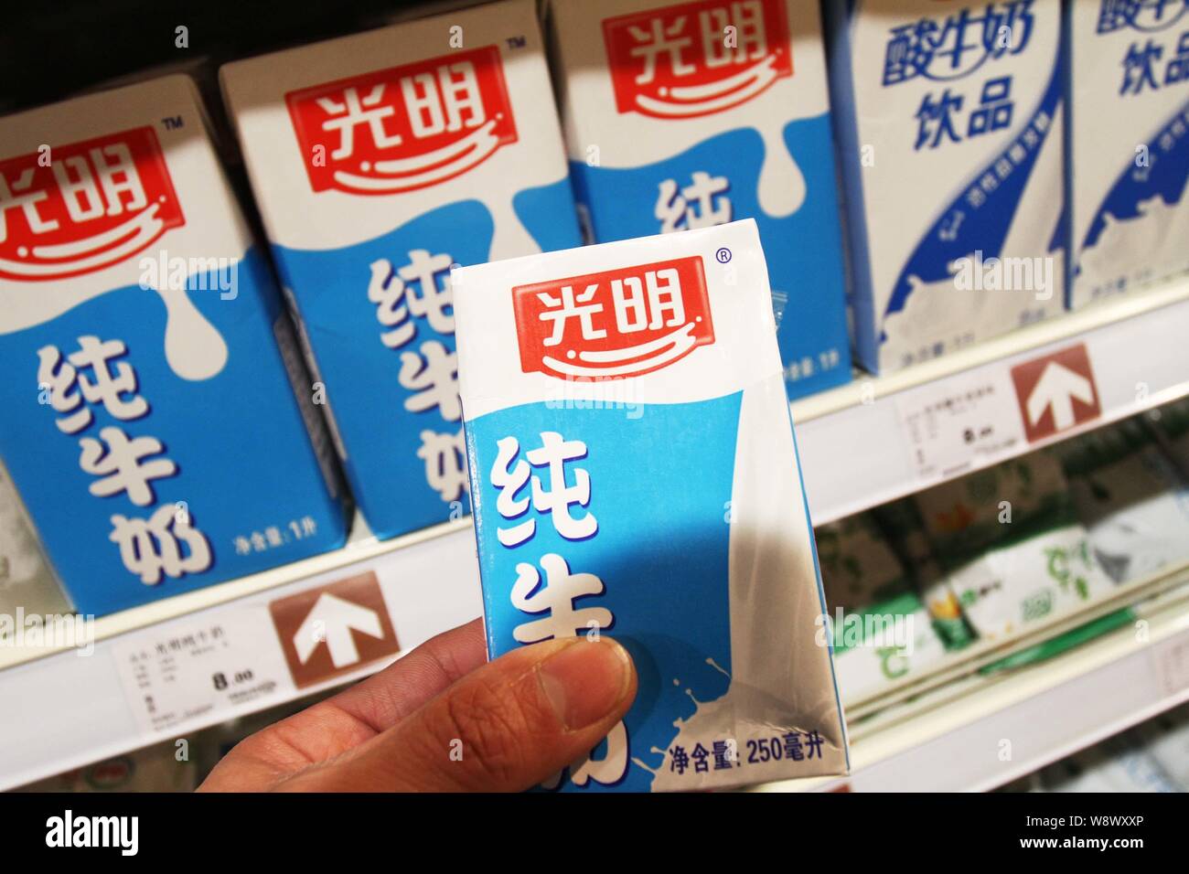 --FILE--A customer buys a carton of pure milk of Bright Dairy, a ...