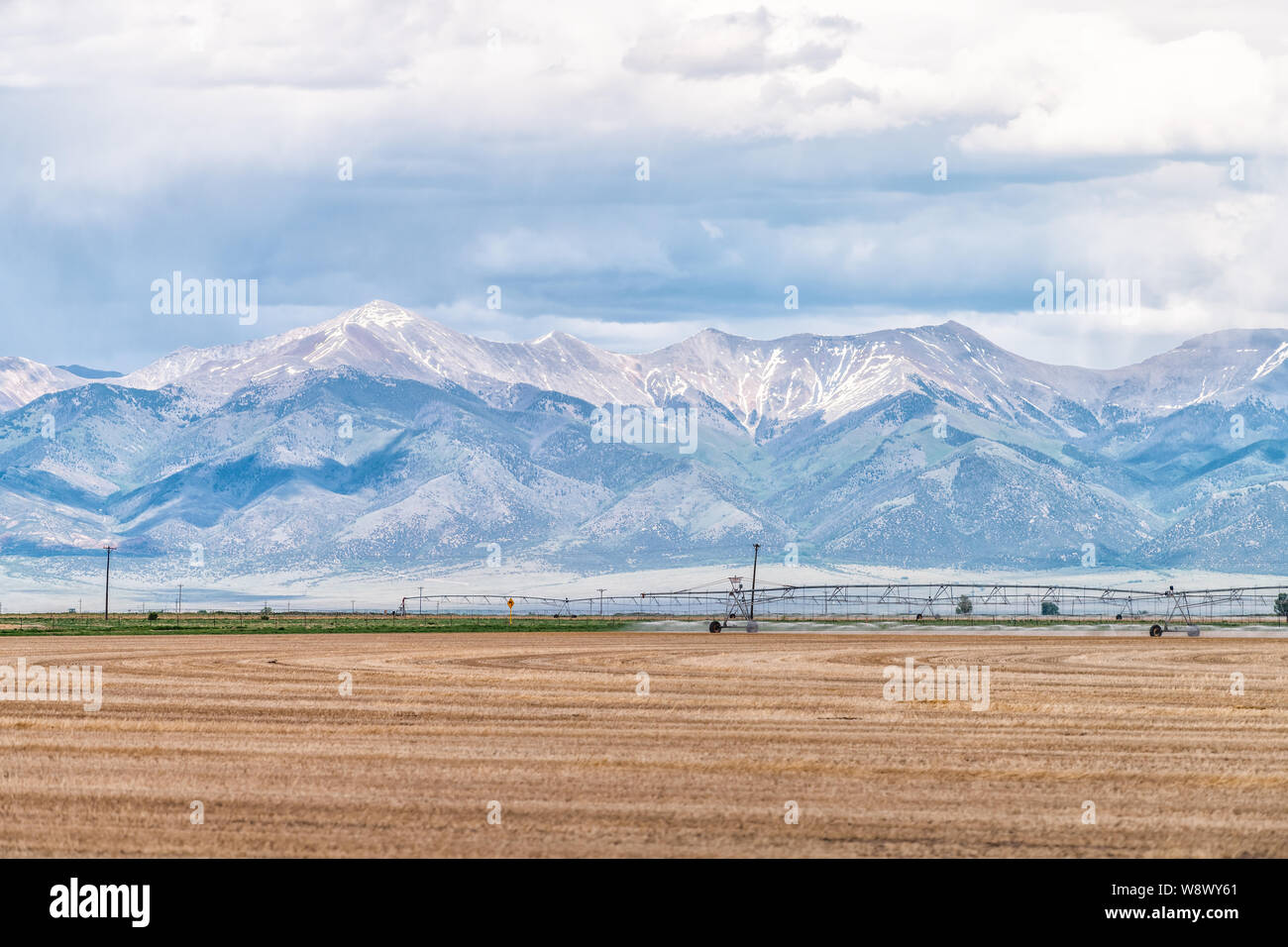 Route 285 in Colorado with rural countryside brown farm near Monte ...