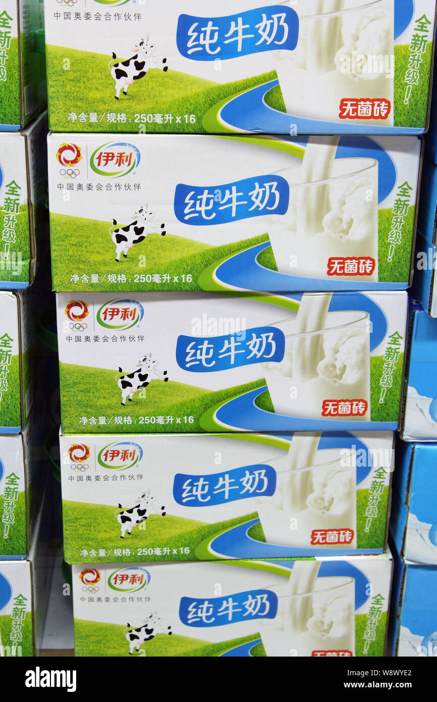 --FILE--Cartons of Yili pure milk are for sale at a supermarket in ...