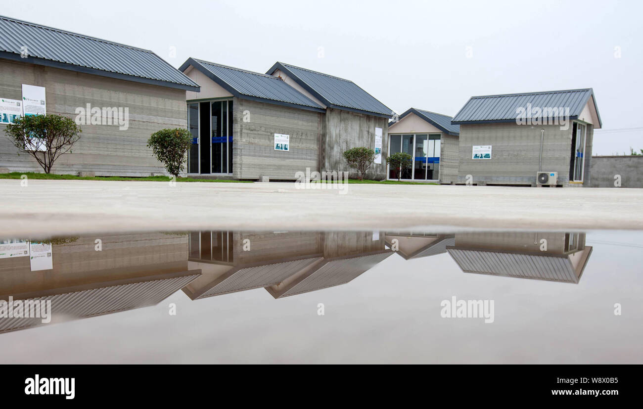 3D printed houses are pictured at the Qingpu Park of the Shanghai ...
