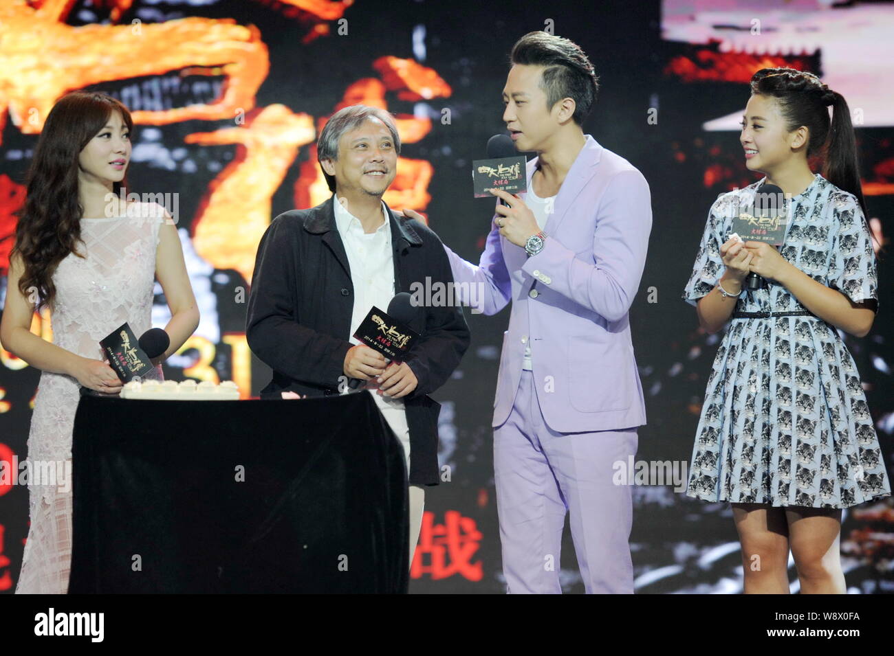 Chinese actor Deng Chao, second right, speaks to Hong Kong director ...