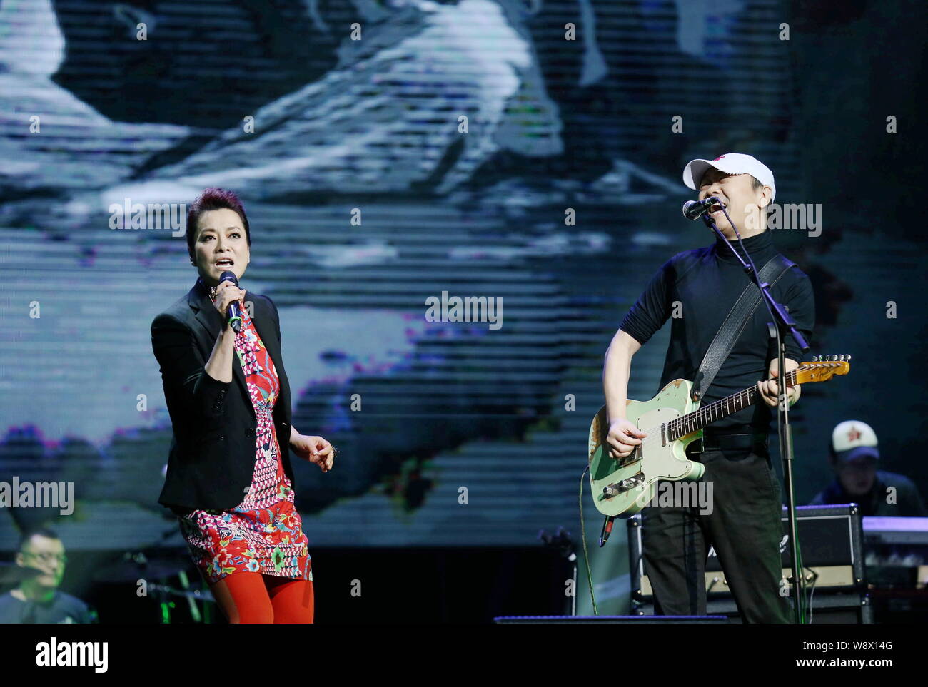 Chinese singers Cui Jian, right, and Mao Amin perform during the ...
