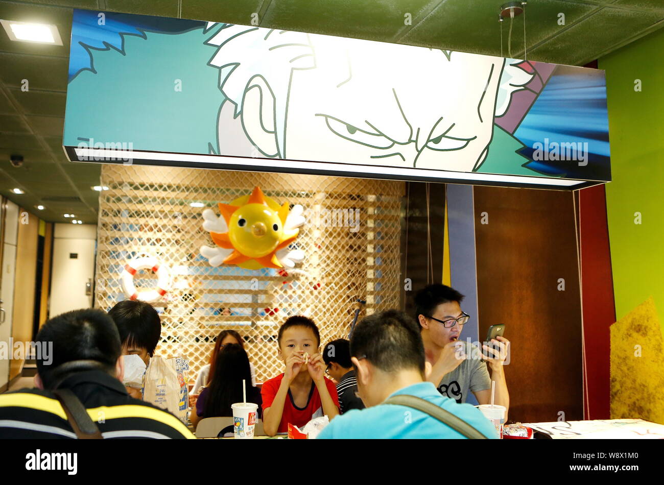 Customers eat at the One Piece-themed McDonalds fastfood restaurant in ...