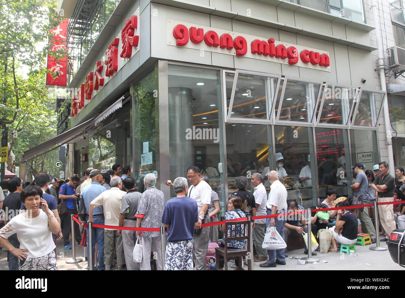Chinese customers queue up to buy mooncakes to celebrate the upcoming ...