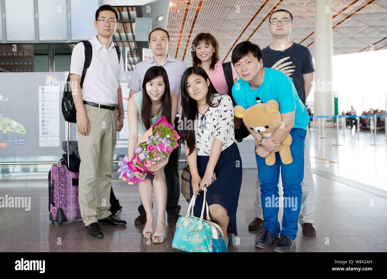 American table tennis player Ariel Hsing, front left, and her mother ...
