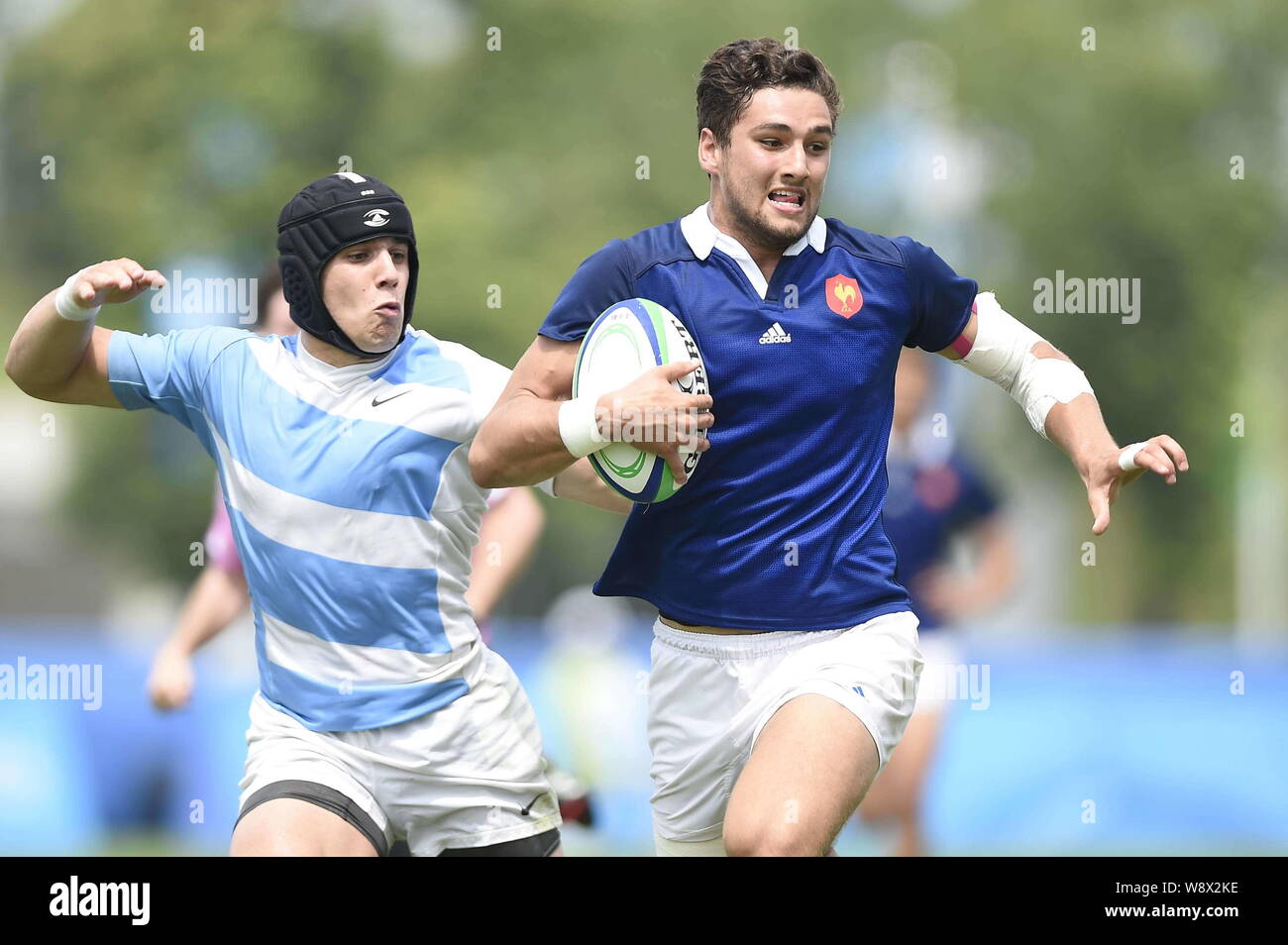 Sacha Valleau of France, right, competes against a player of Argentina ...