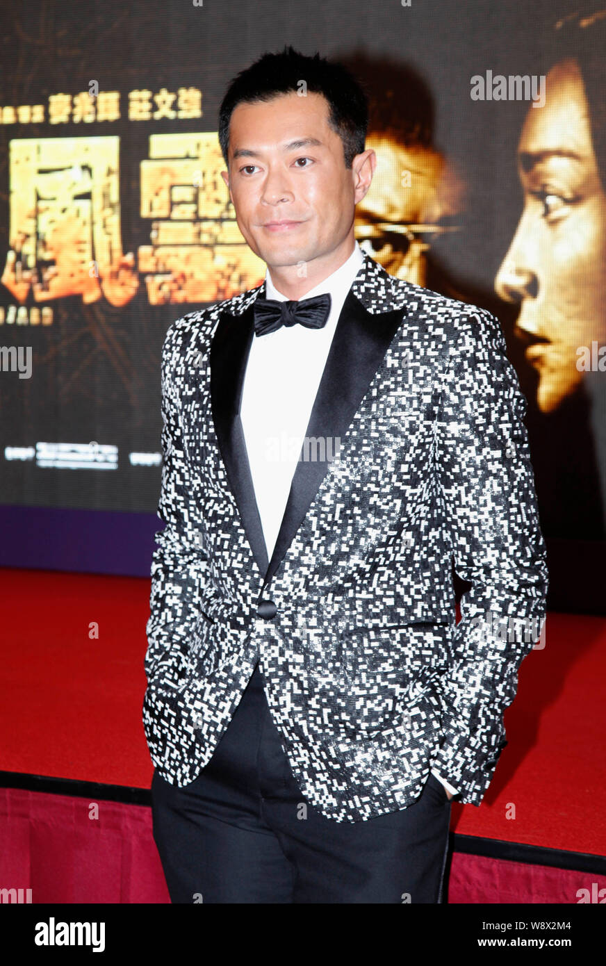 Hong Kong actor Louis Koo Tin-lok poses during a premiere for his new ...