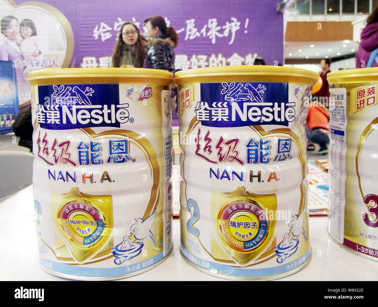 --FILE--Tins of Nestle baby formula are displayed during an exhibition ...
