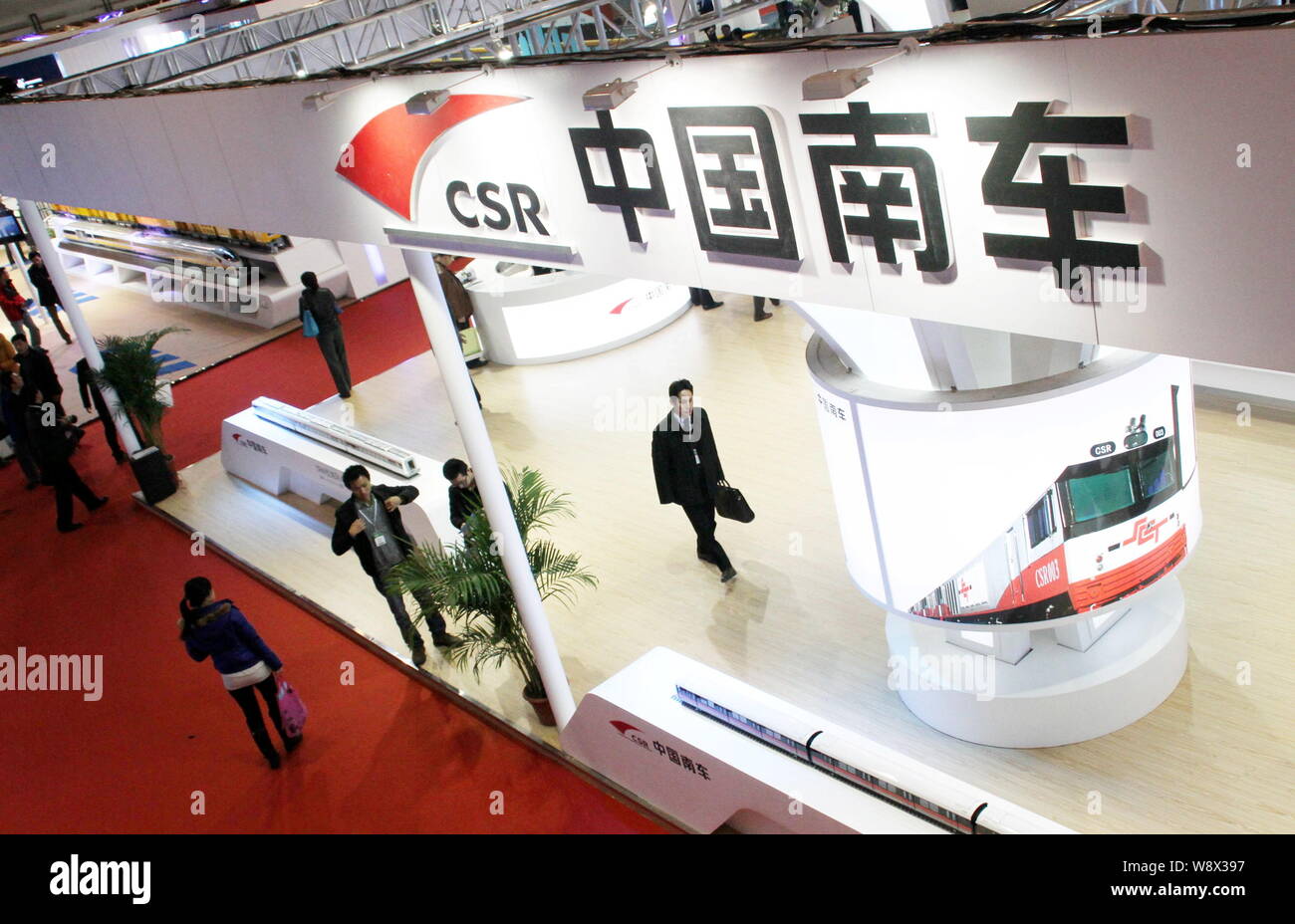 --FILE--People visit the stand of CSR (China South Locomotive and ...