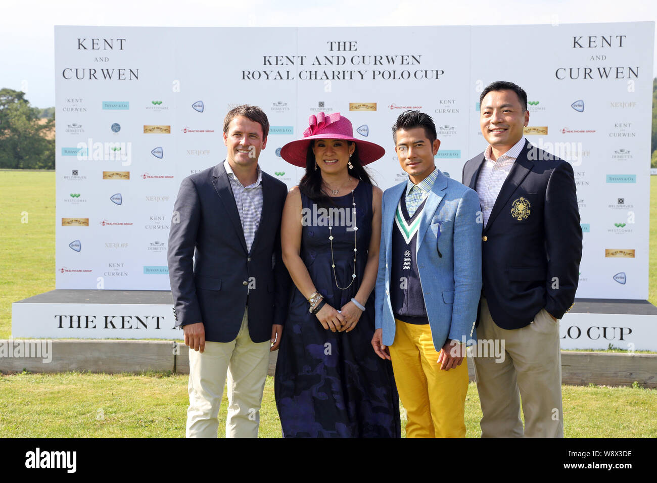 Hong Kong singer Aaron Kwok, second right, and English football star ...