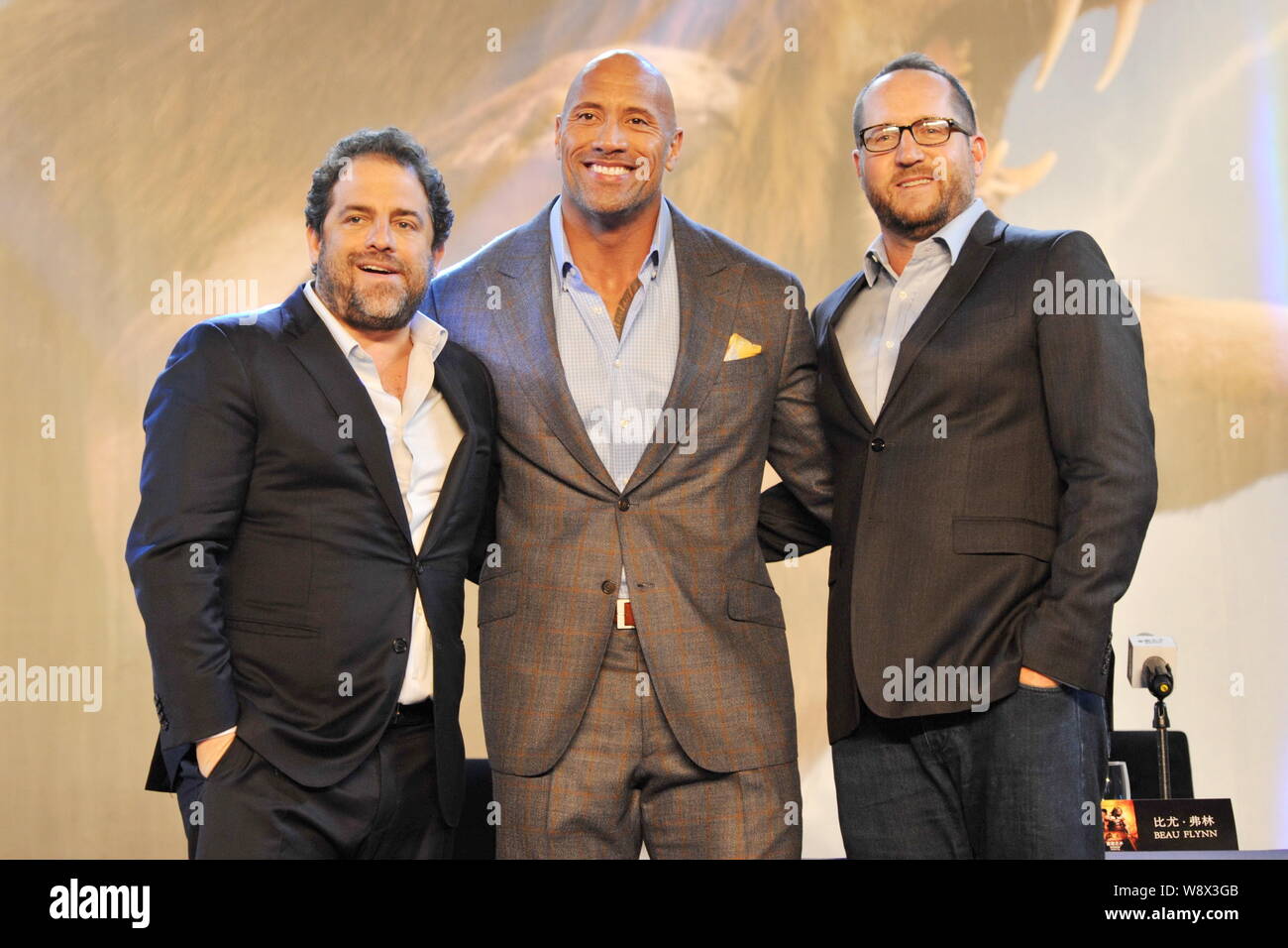 (From left) American director Brett Ratner, actor Dwayne Johnson and ...