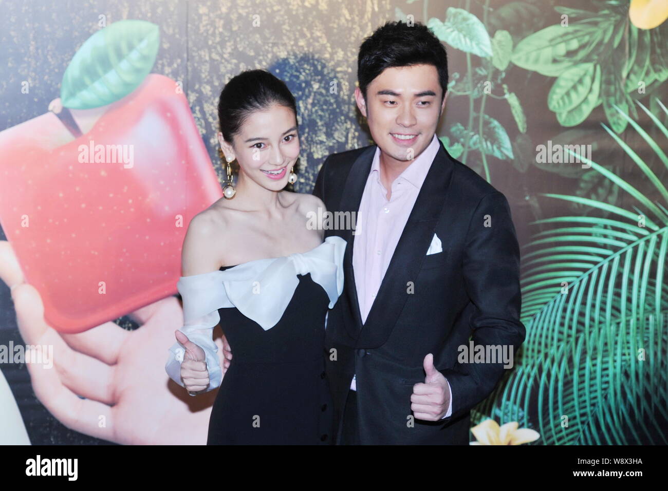 Hong Kong actress Angelababy, left, and Chinese actor Chen He pose on ...