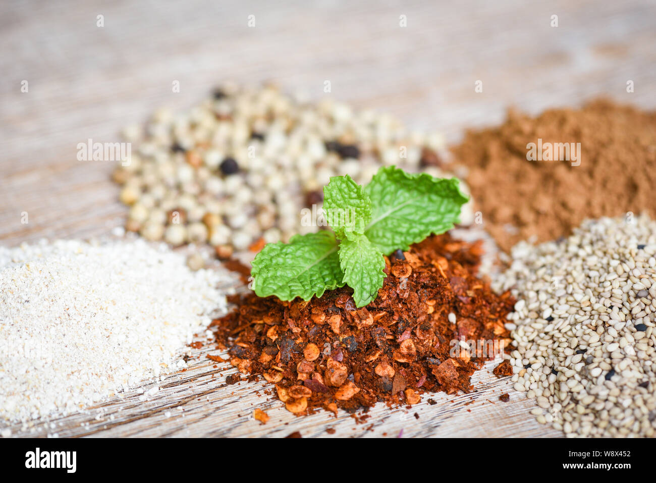 spices background and peppermint leaf / close up of herbs and spices ...