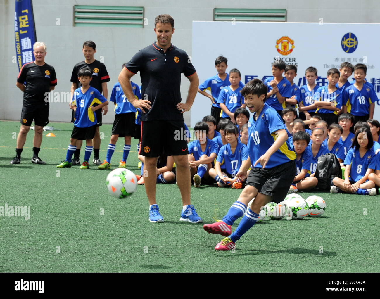 Former Norwegian football player Ronny Johnsen, front left, looks at a ...