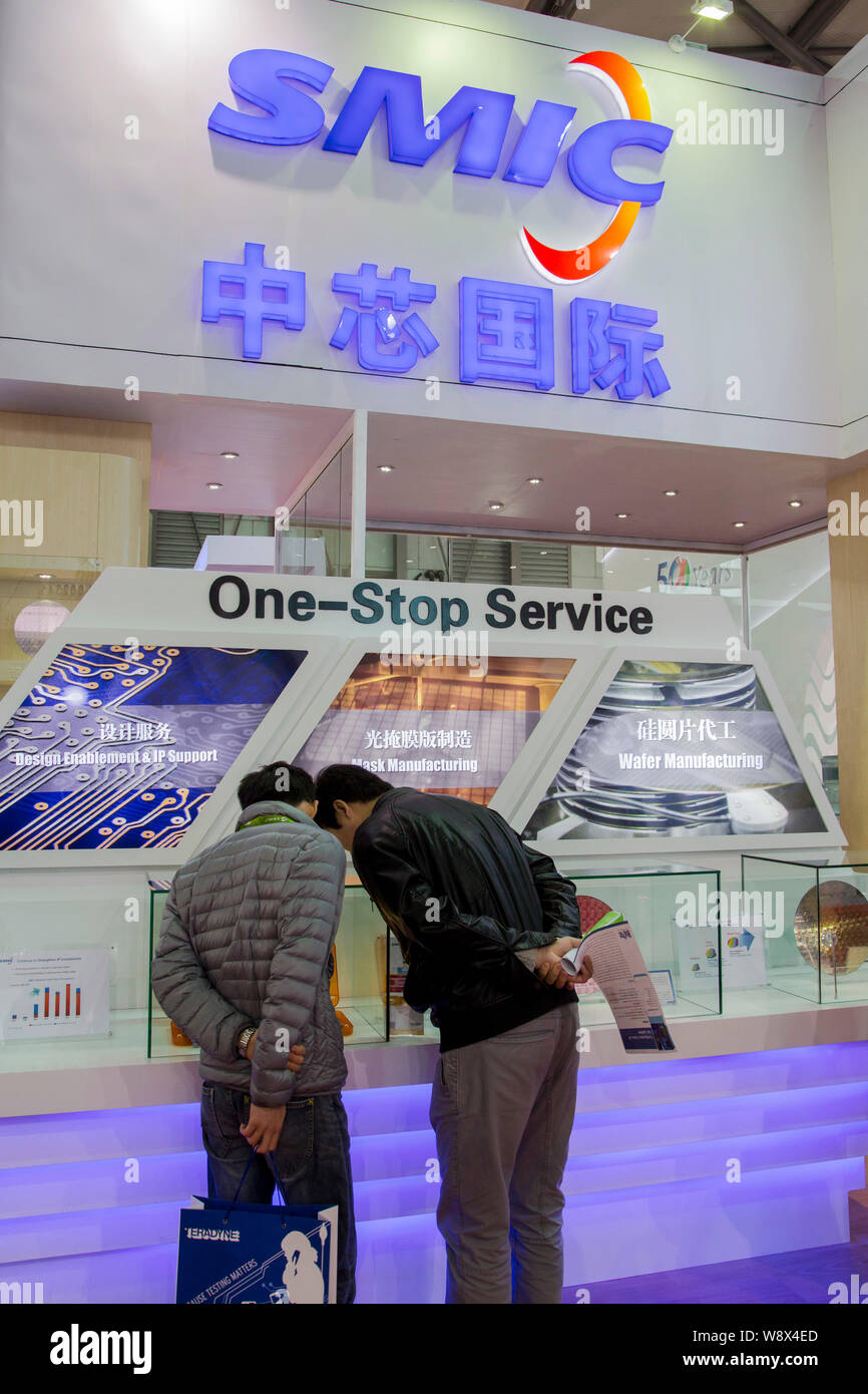 --FILE--People visit the stand of SMIC (Semiconductor Manufacturing ...