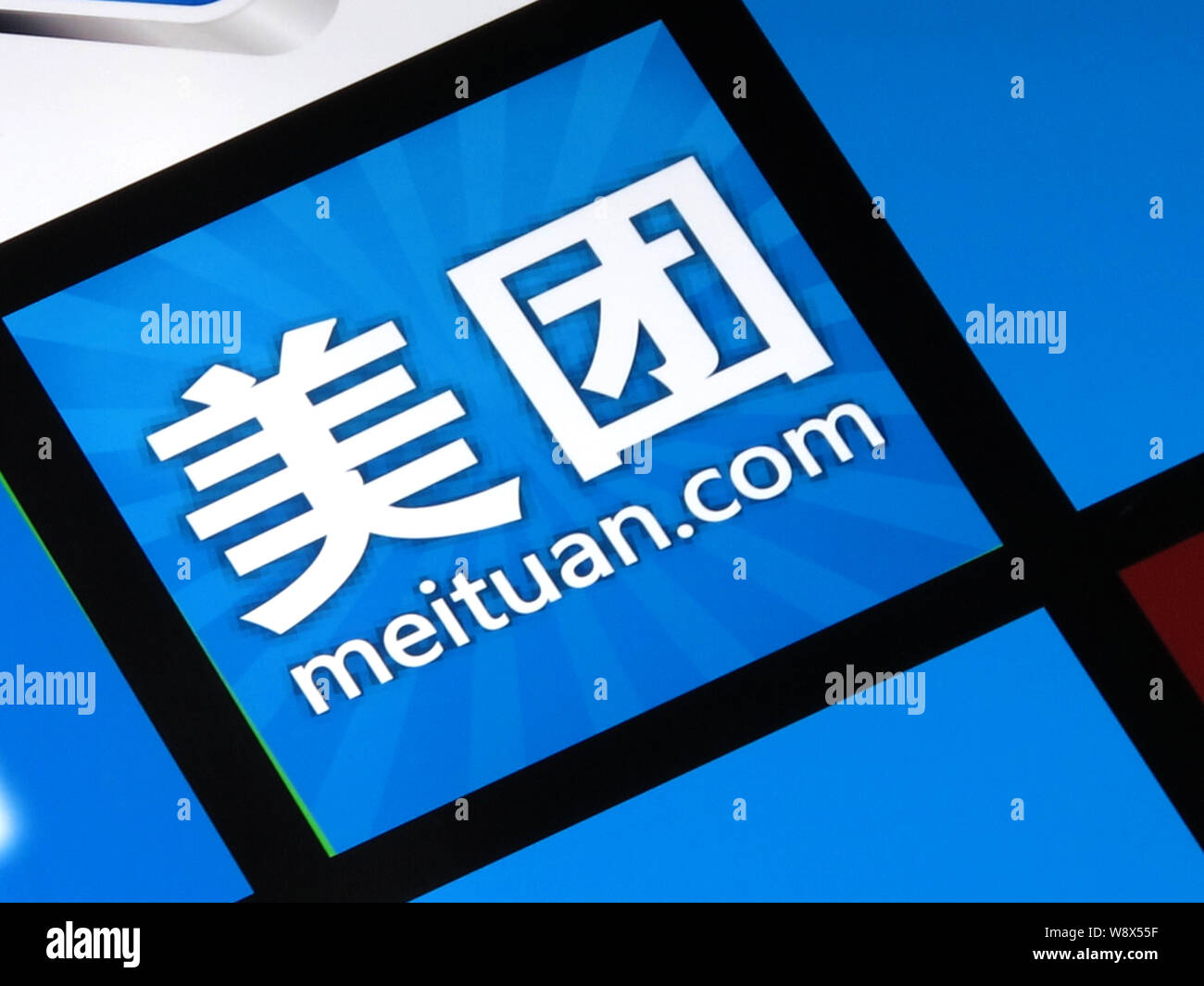 --FILE--View of a logo of the online group buying website meituan.com ...