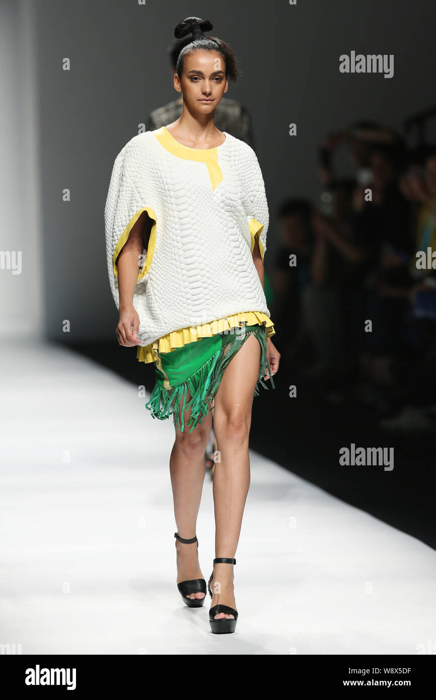 A model displays a new creation at the Jess Zhao fashion show during ...