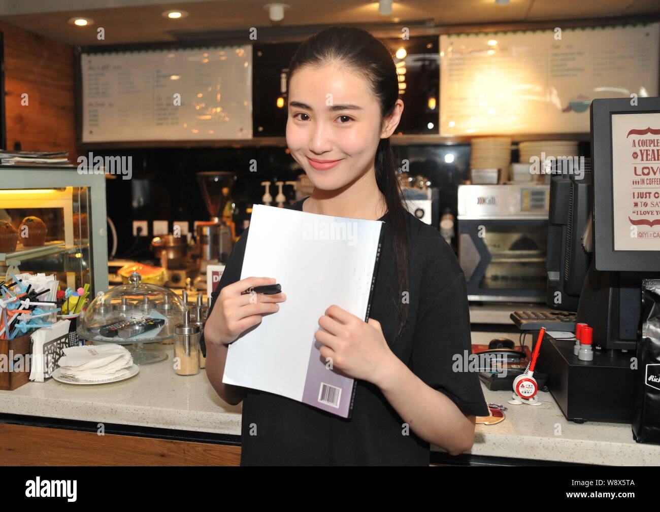 Chinese actress Zhang Xinyuan poses at the shooting scene of her new TV ...