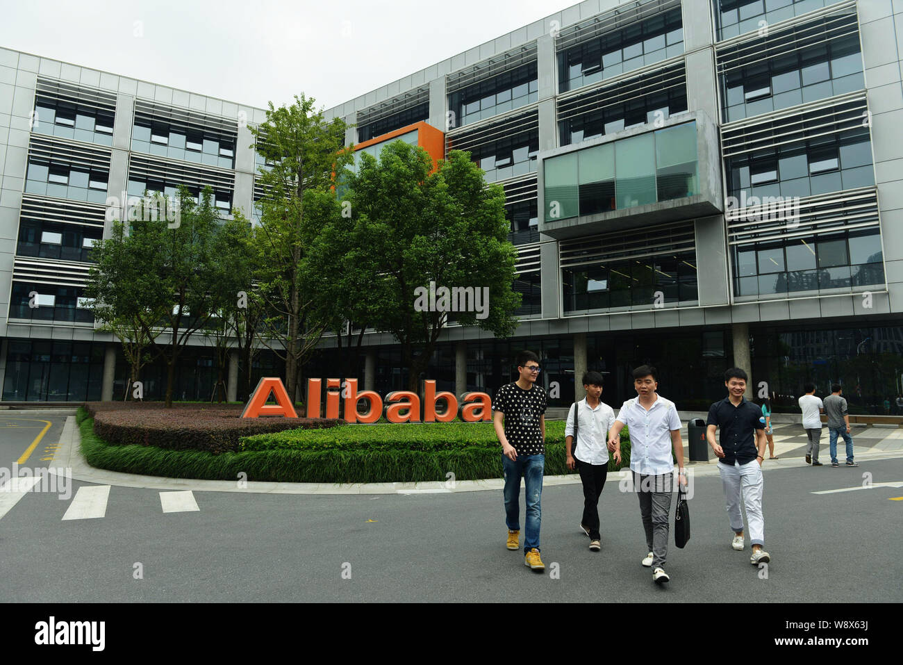 --FILE--Chinese employee walk at the headquarters of Alibaba Group in ...