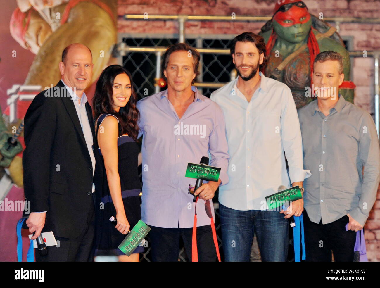 American actress Megan Fox, second left, actor William Fichtner, center ...