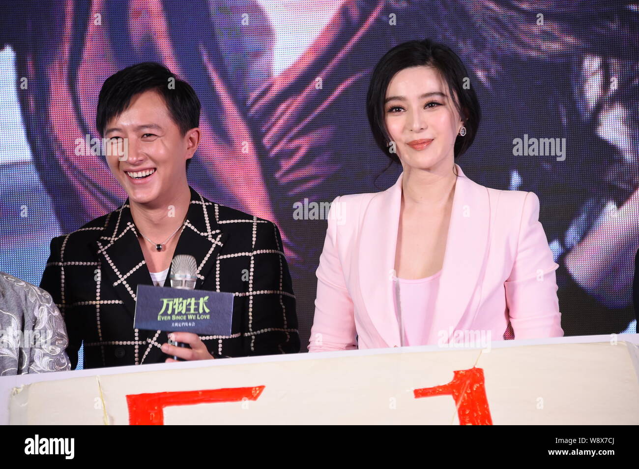 Chinese actress Fan Bingbing, right, and actor Han Geng pose during a ...