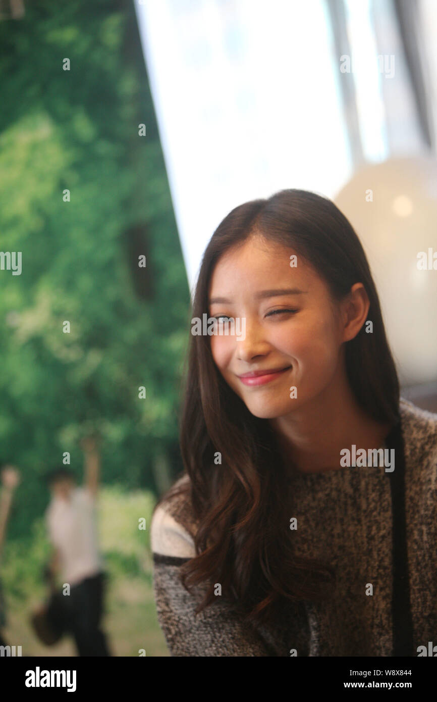 Chinese actress Ni Ni makes faces at a promotional event for her new ...