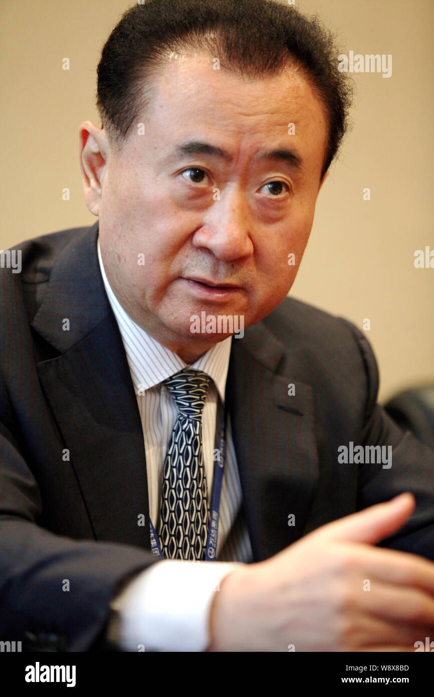--FILE--Wang Jianlin, Chairman of Wanda Group, answers a question during an interview in Beijing ...
