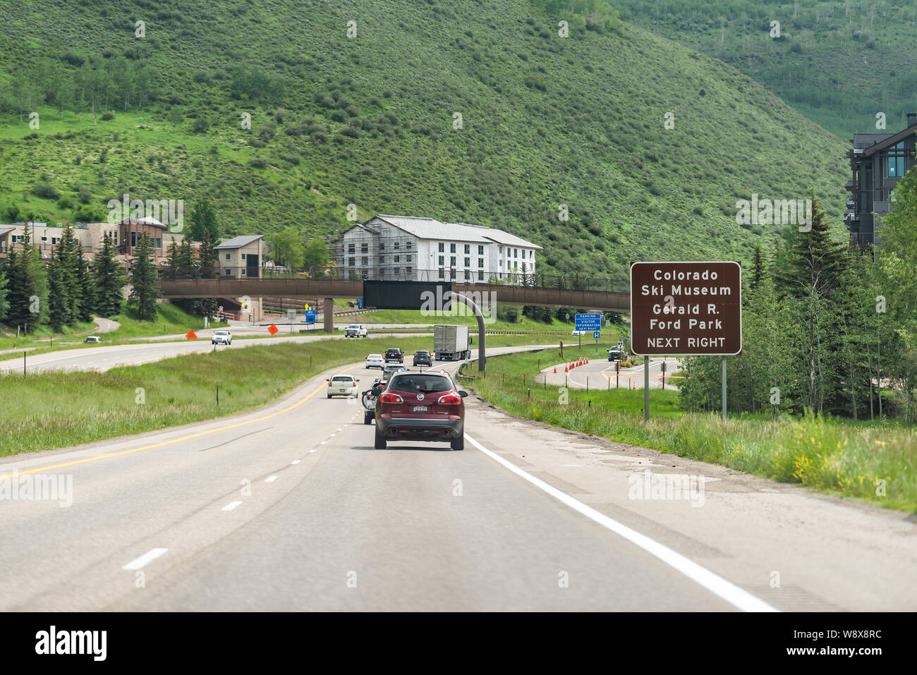 Vail, USA - June 29, 2019: Road highway through Colorado town with sign ...