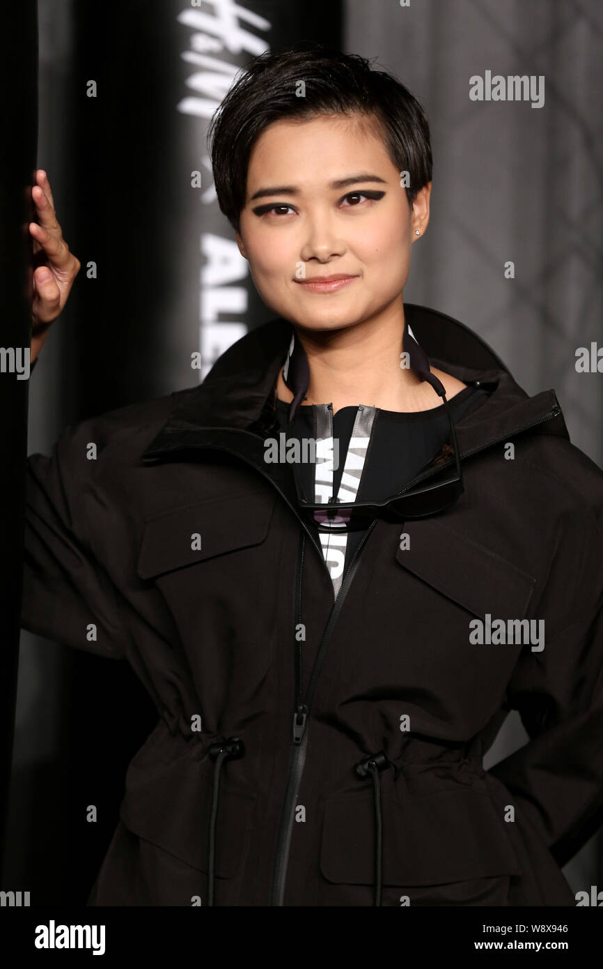 Chinese singer Li Yuchun poses on the red carpet for the press ...