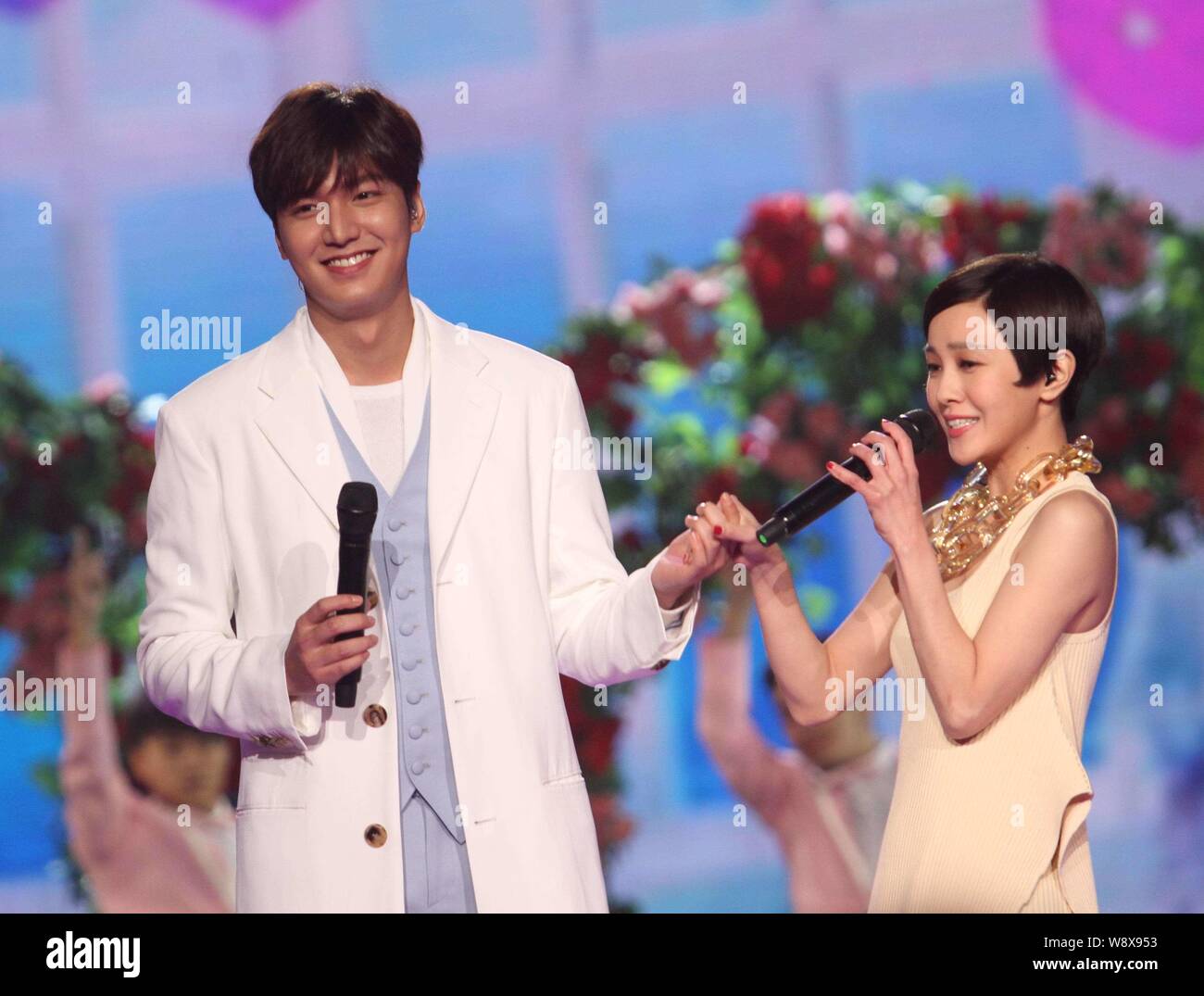 Taiwanese actress Amber Kuo, right, and South Korean actor Lee Min-ho ...