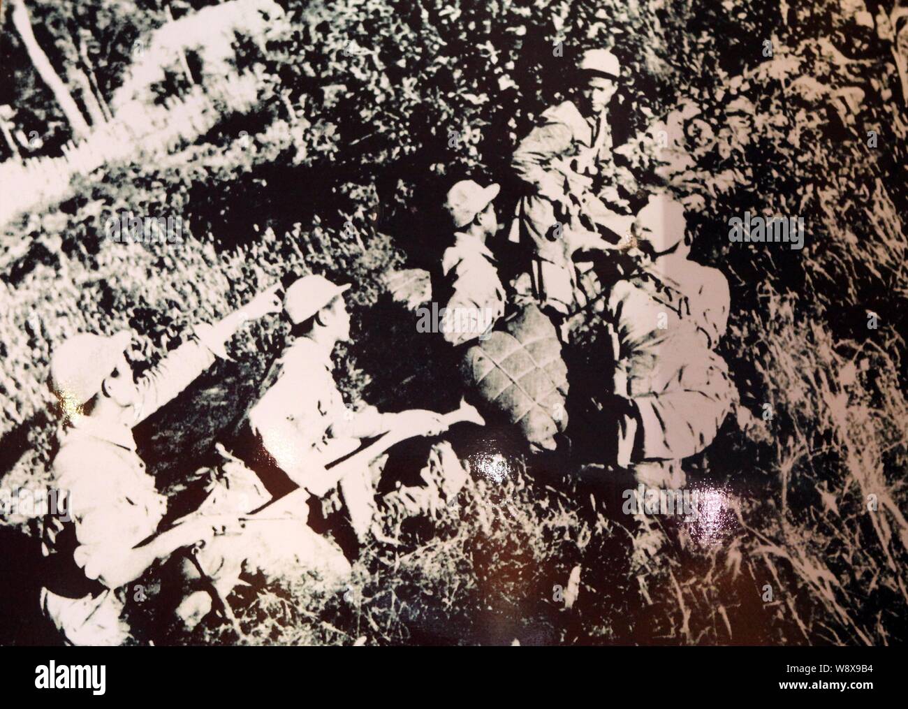 In this picture of a historical photo, Chinese soldiers of the Binhai ...
