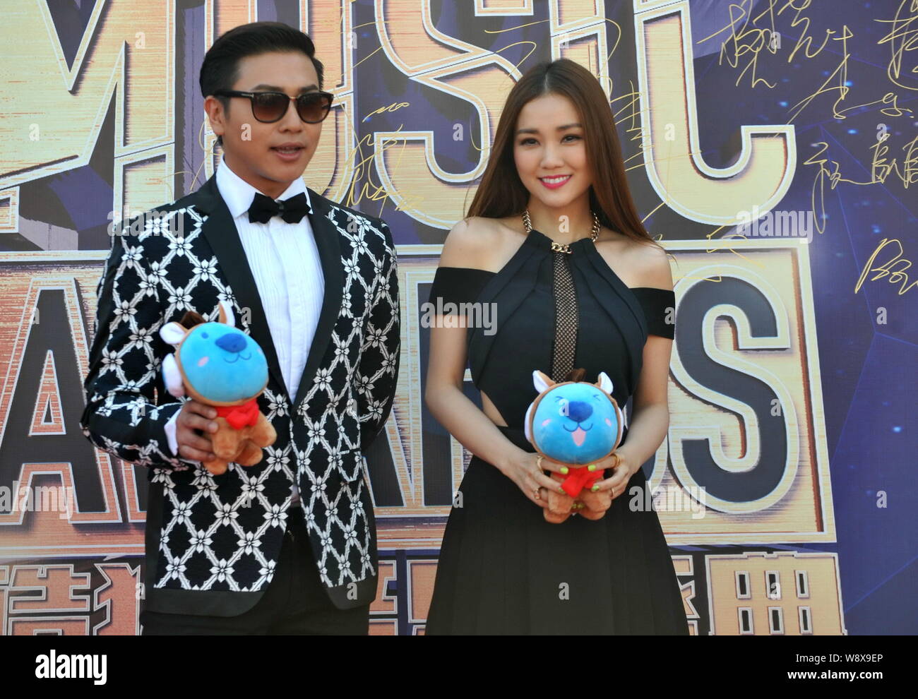 Taiwanese singer and host O.D, left, Hong Kong singer and actress Kay ...