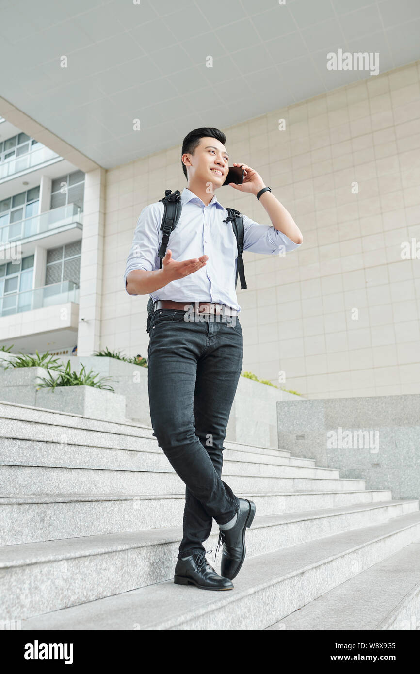 University student calling on phone Stock Photo - Alamy
