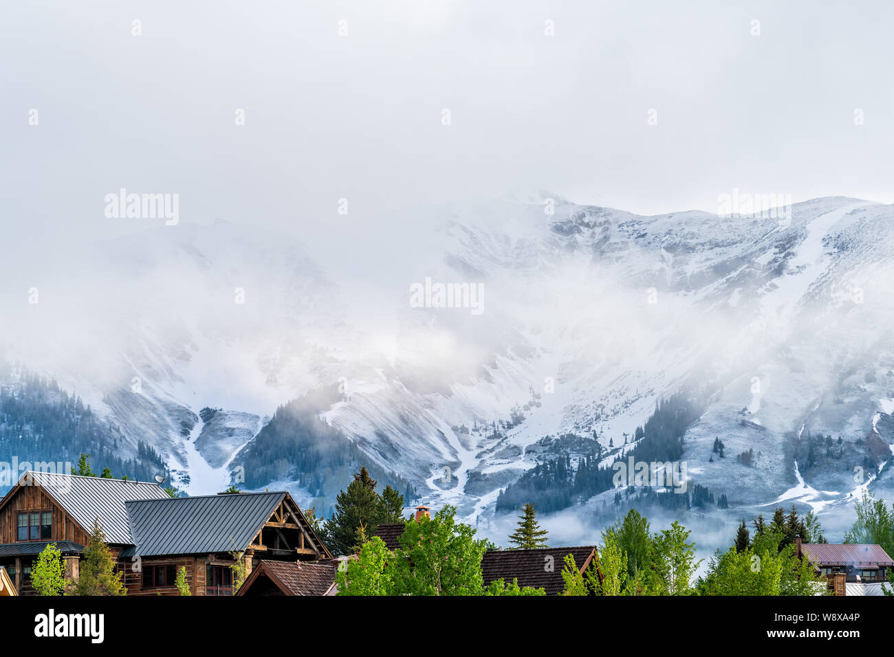 Mount Crested Butte, USA Colorado village in summer with clouds and ...