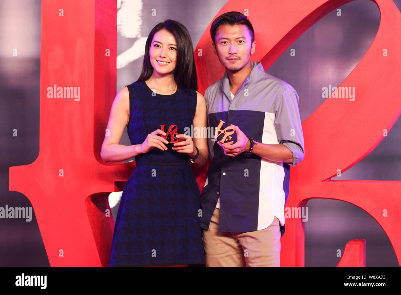 (From left) Chinese actress Gao yuanyuan and Hong Kong actor Nicholas Tse pose during a premiere ...