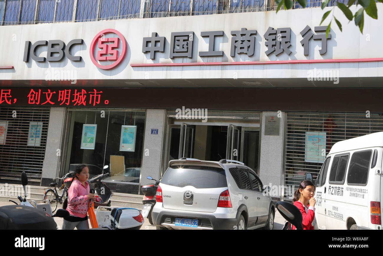 --FILE--Pedestrians walk past a branch of ICBC (Industrial and ...