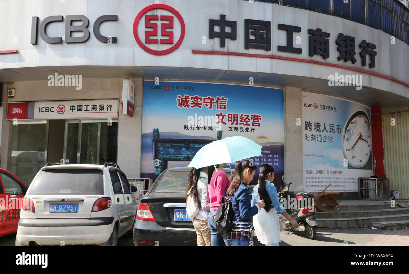 --FILE--Pedestrians walk past a branch of ICBC (Industrial and ...