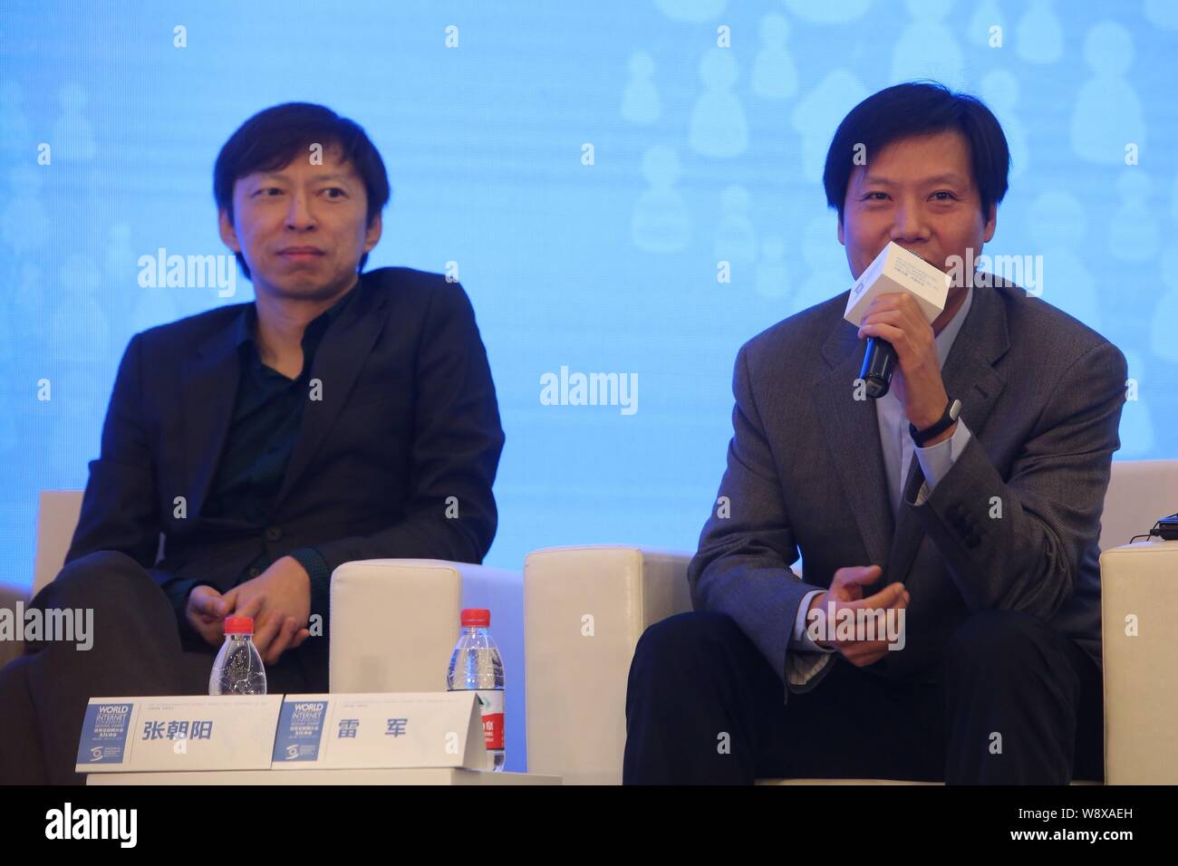 Charles Zhang Chaoyang, left, CEO of Sohu.com Inc., and Lei Jun ...