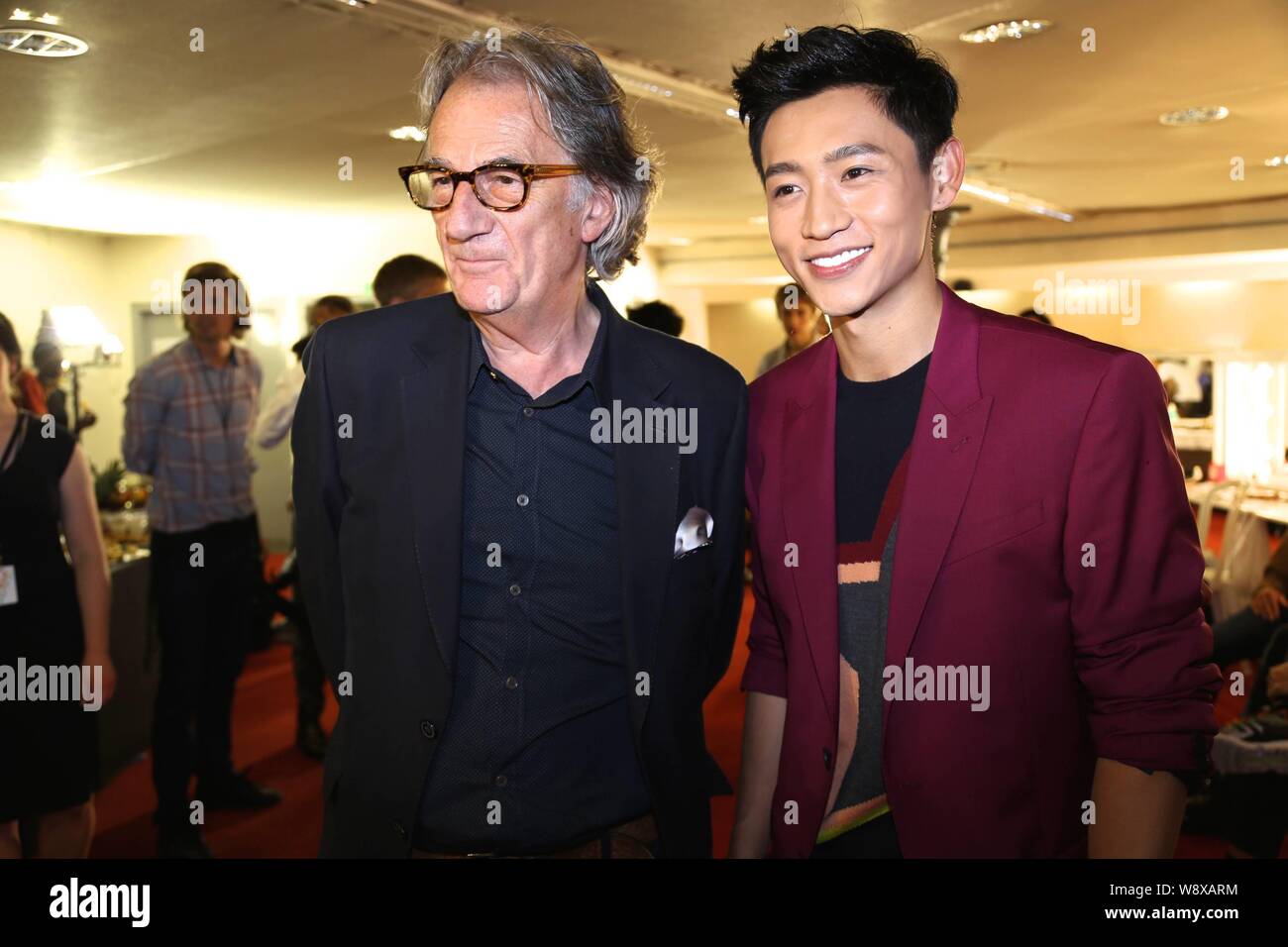 English fashion designer Paul Smith, left, and Chinese singer Wei Chen ...