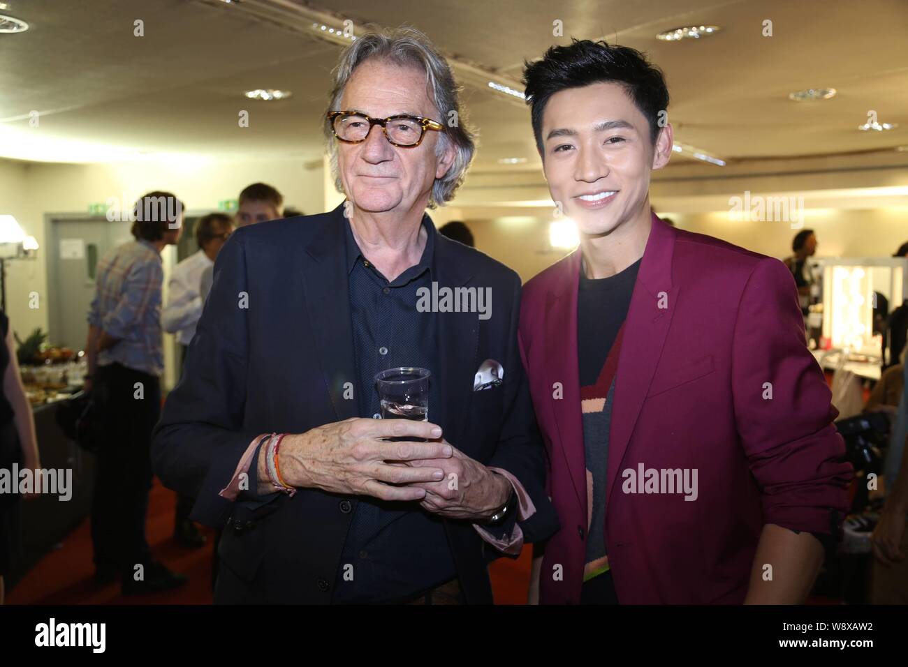 English fashion designer Paul Smith, left, and Chinese singer Wei Chen ...