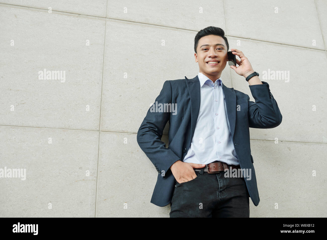 Businessman making phone call outdoors hi-res stock photography and ...