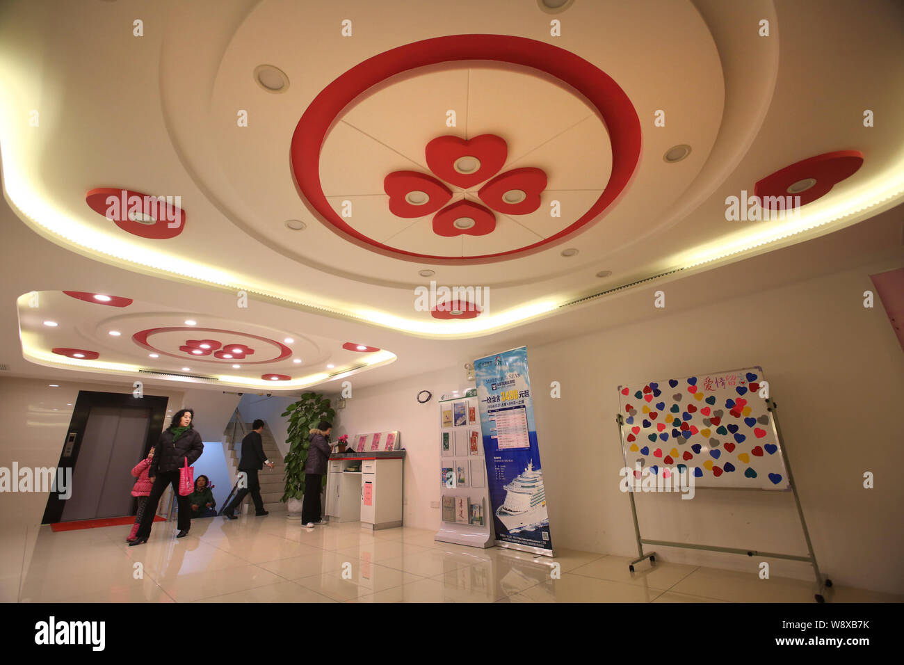 Chinese customers visit the Love Post Office, a branch of China Post on ...