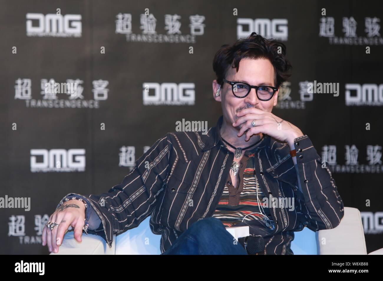 American actor Johnny Depp shows off his new engagement ring on his ...