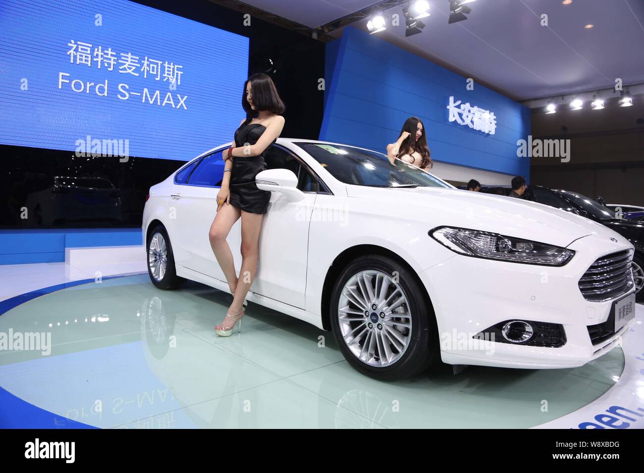--FILE--Models pose with a New Mondeo of Ford at an auto show in ...