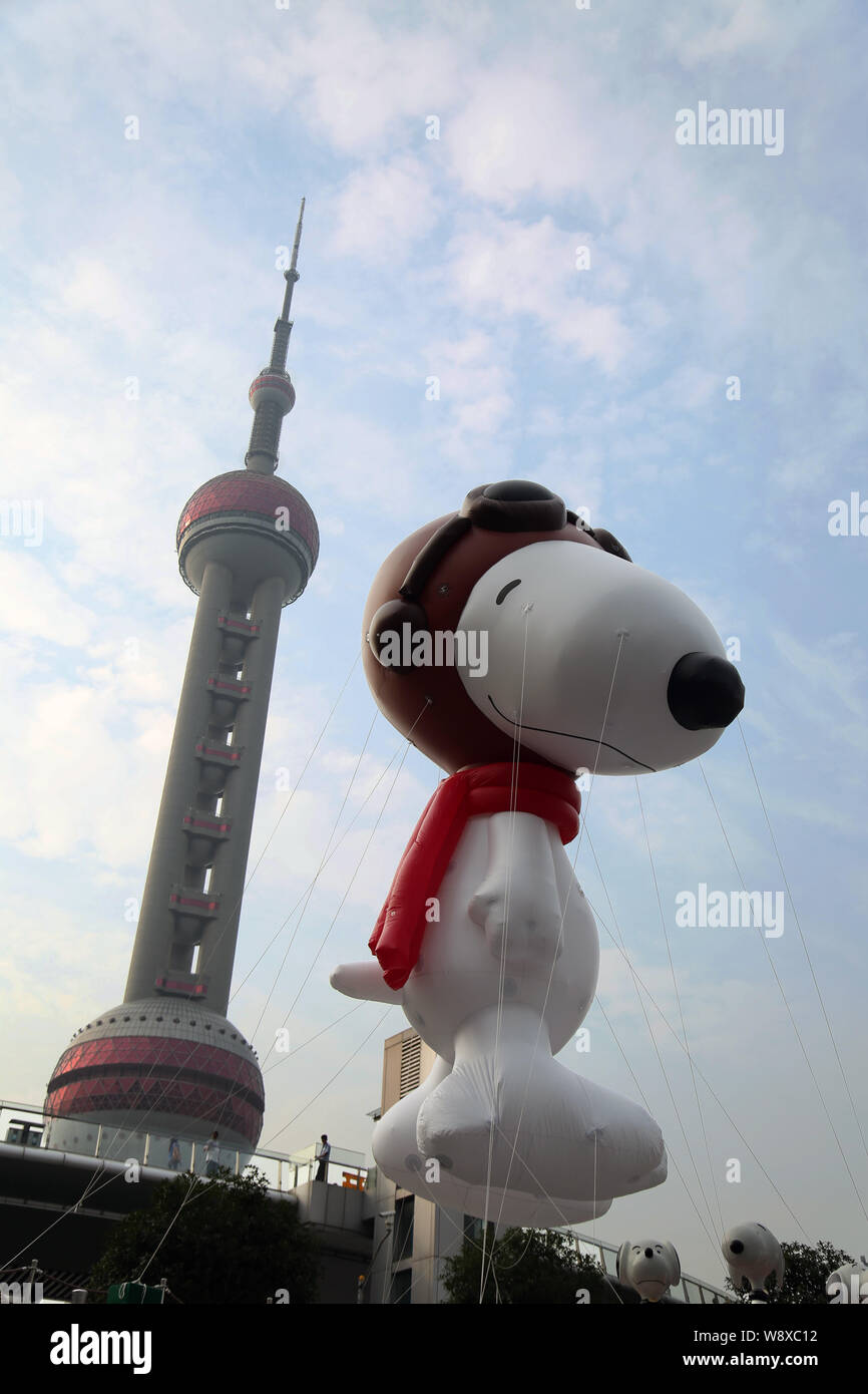 An 8-meter-high Snoopy balloon is seen at Shanghai ifc Mall during an ...