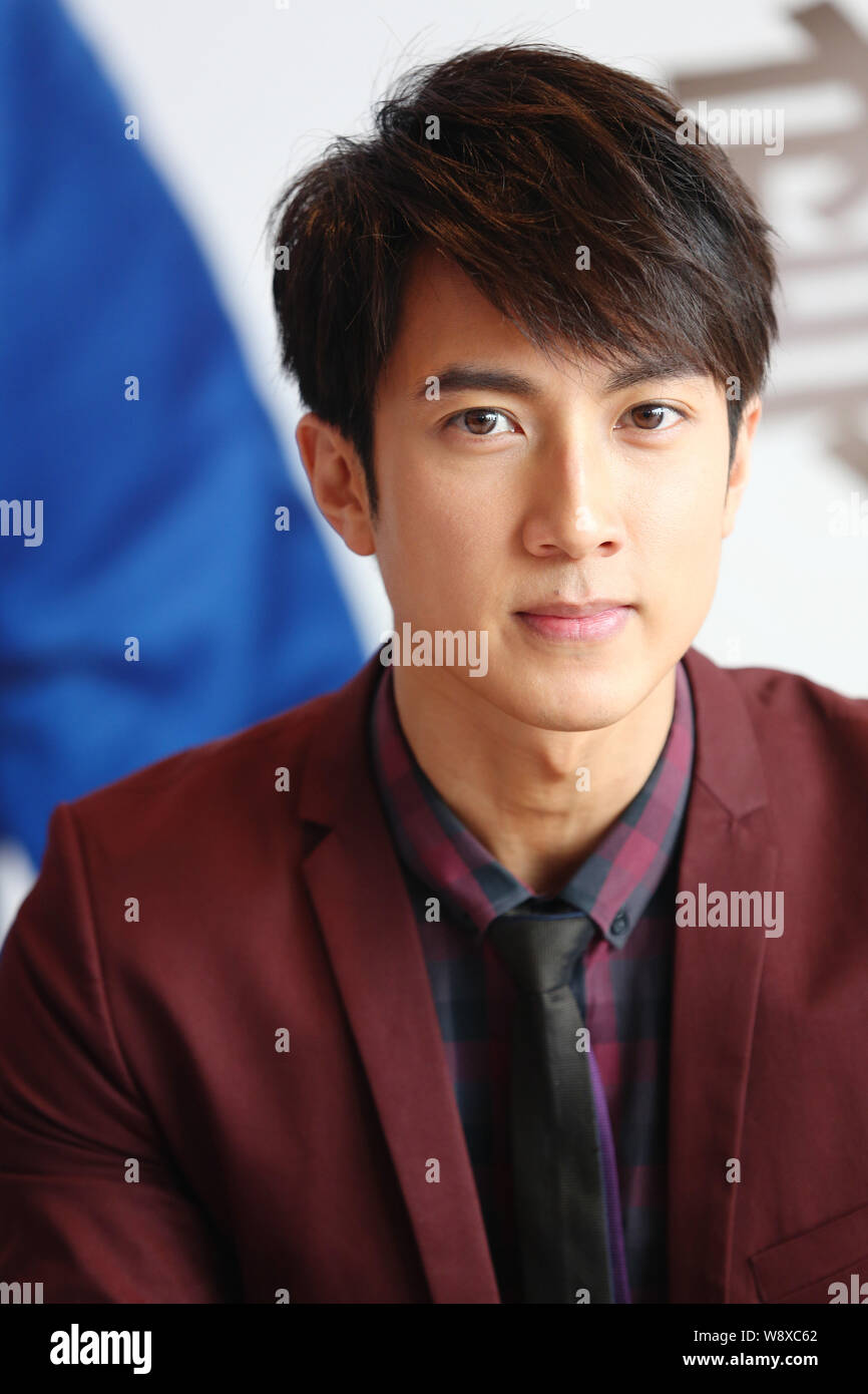 Bruneian actor Wu Chun poses during a signing ceremony for becoming the ...