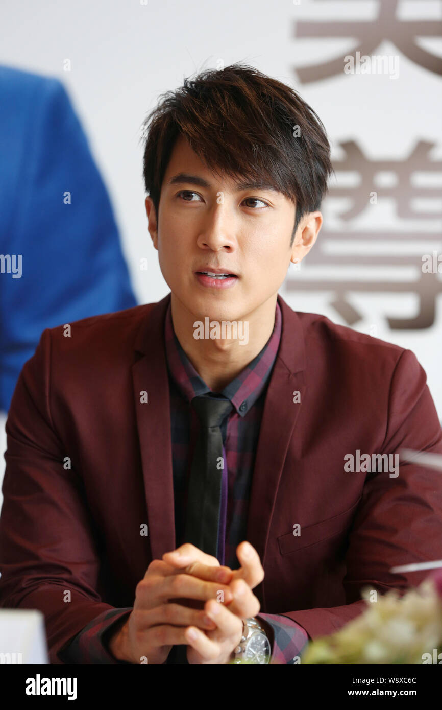 Bruneian actor Wu Chun poses during a signing ceremony for becoming the ...