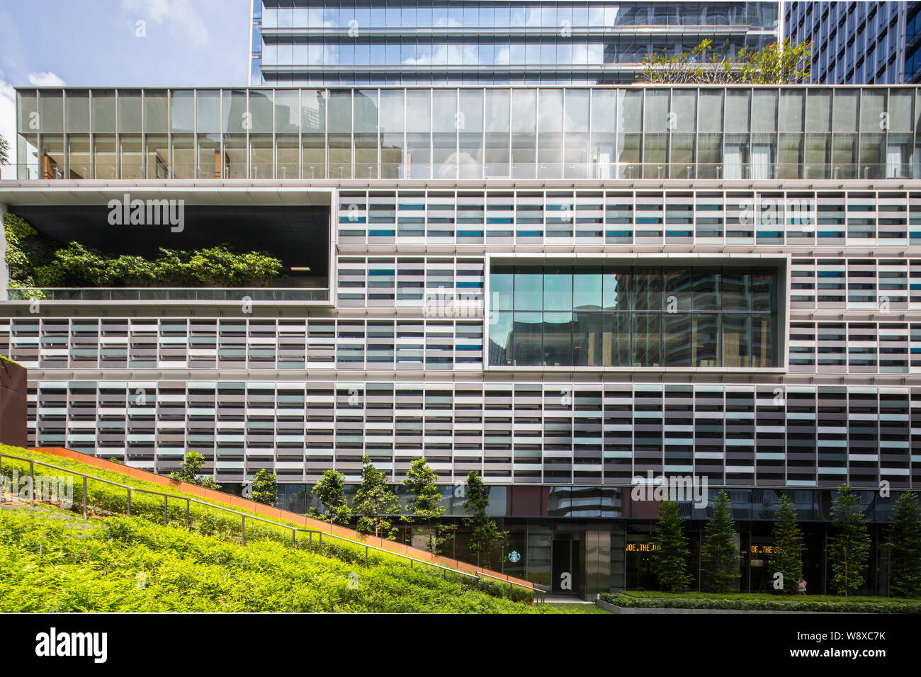Outdoor facade of Sofitel Singapore City Centre beside Guoco Tower ...